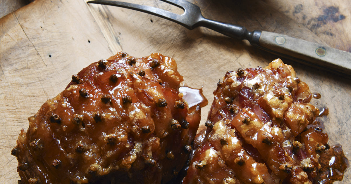 Food and Travel Magazine | Maple-glazed ham shanks studded with…